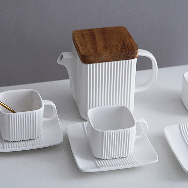 White ceramic coffee cup set