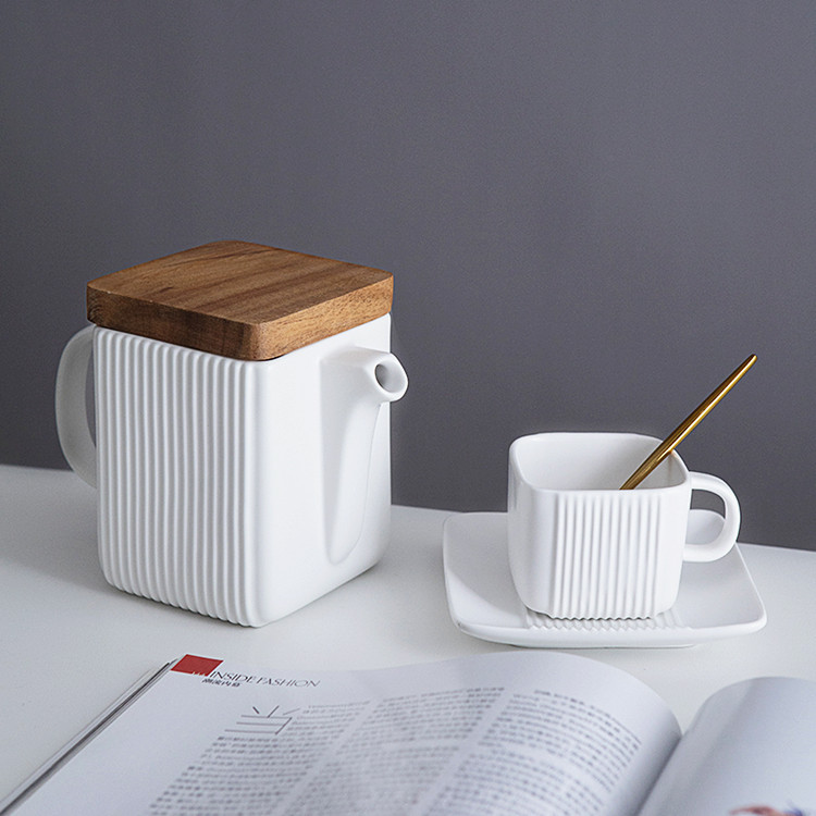 White ceramic coffee cup set
